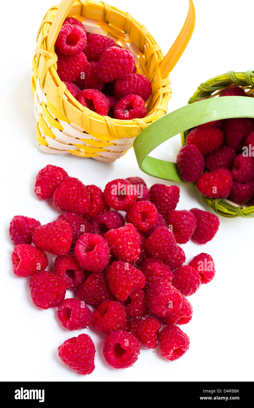 Heap of organic raspberries on white background Stock Photo - Alamy