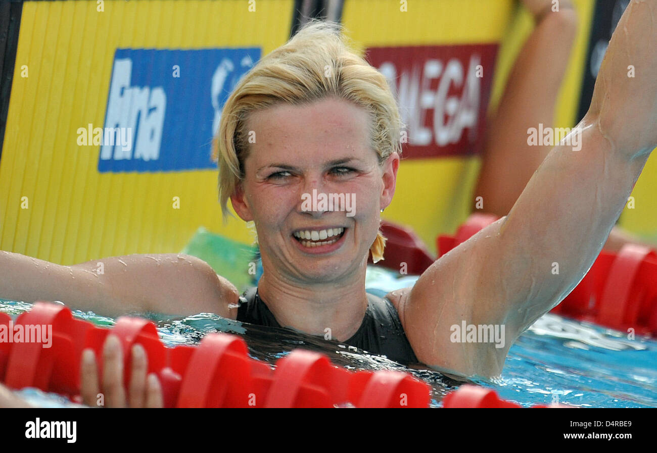 German swimmer Britta Steffen cheers after winning the women?s 100m ...