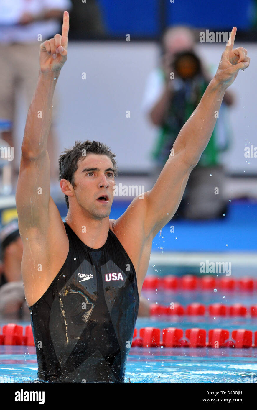 US swimmer Michael Phelps cheers about his victory at the men?s 100m ...