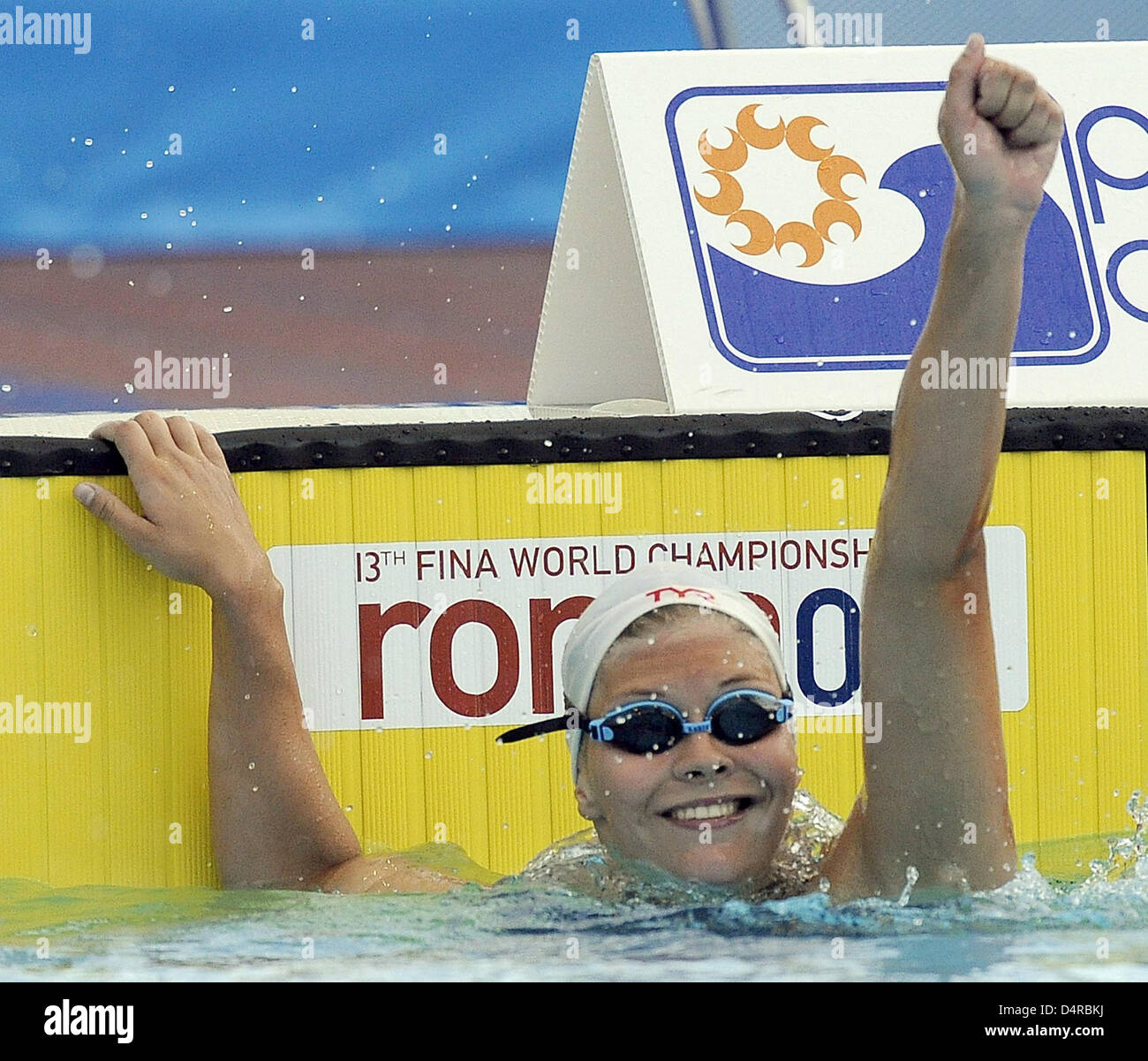 Danish swimmer Lotte Friis cheers after her victory at the women?s 800m ...