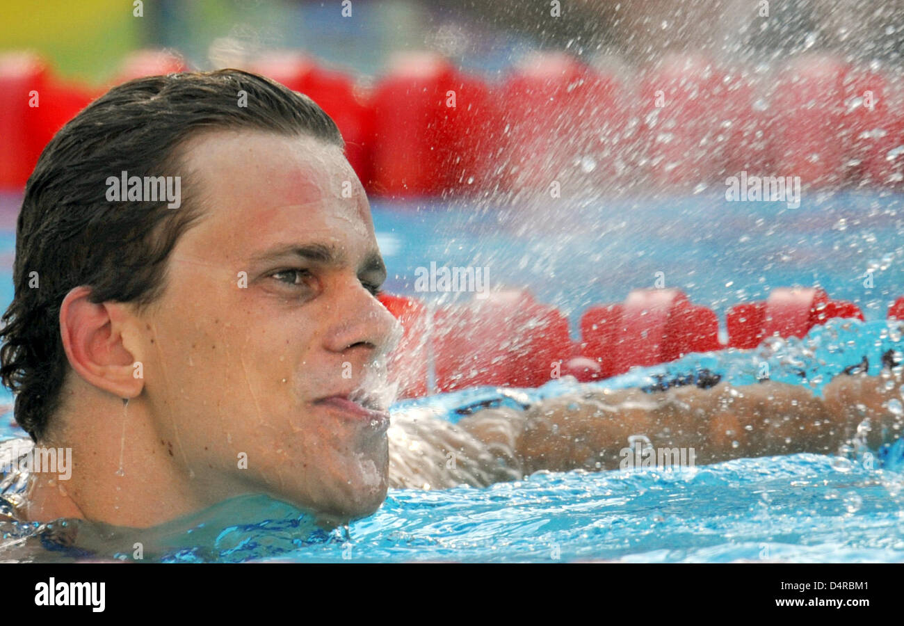Brazilian swimmer Cesar Cielo Filho cheers about his victory at the men ...