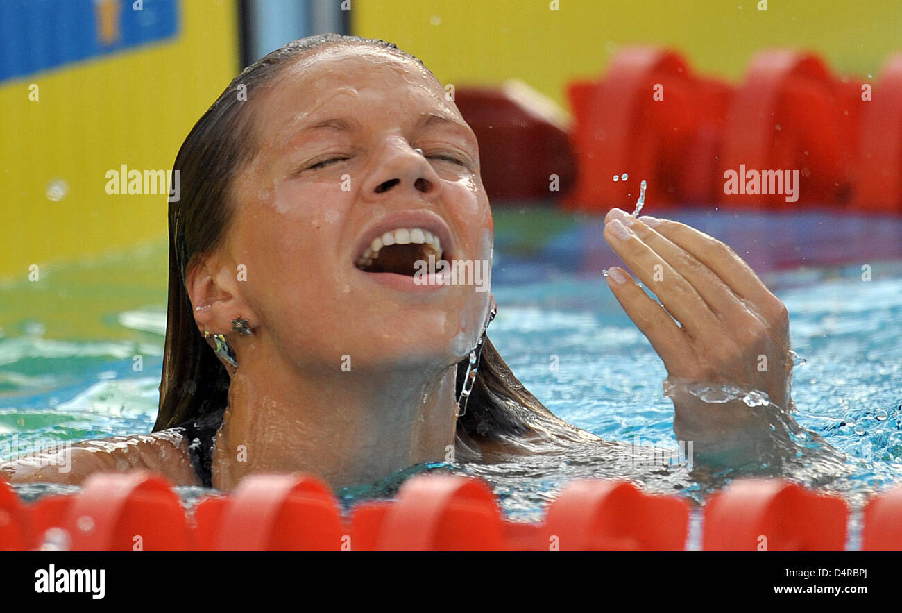 Russian swimmer Julia Efimova cheers after her victory at the women?s ...