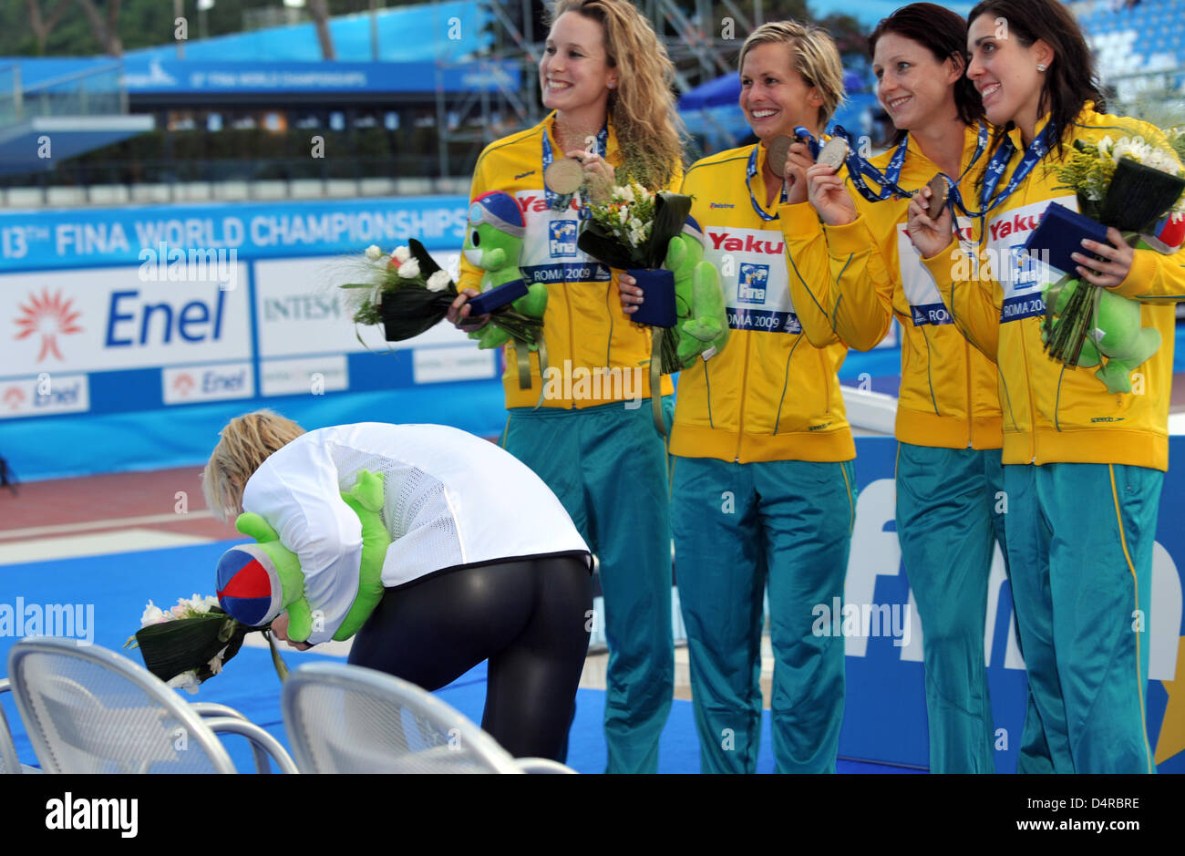 German swimmer Britta Steffen (L) sneaks by the Australian team ...