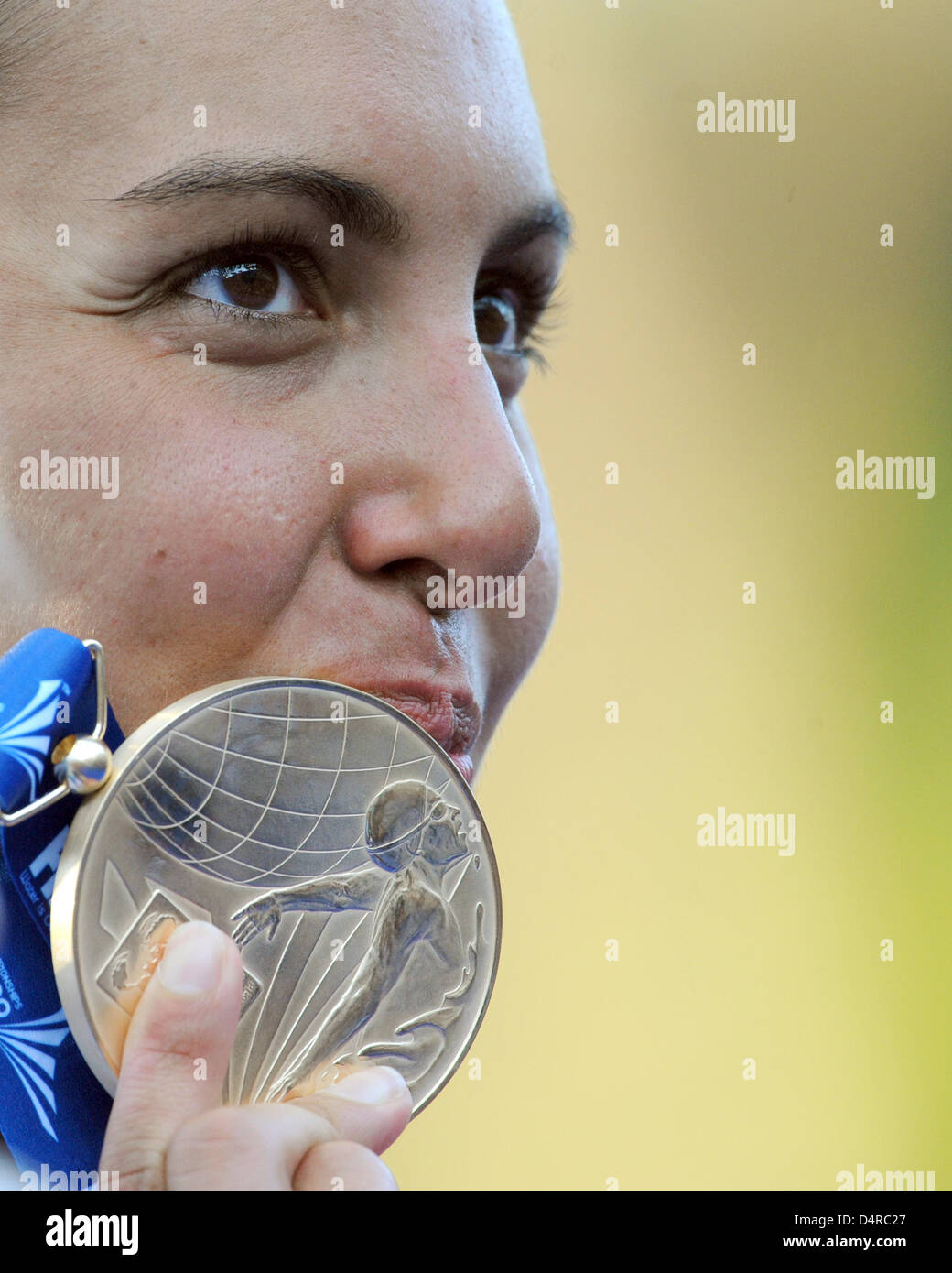 Italian swimmer Alessia Filippi poses with her gold medal after her ...