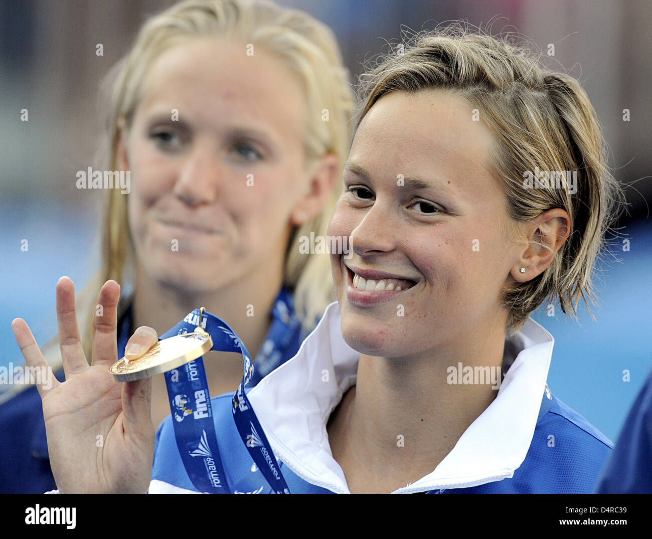 Italian swimmer Federica Pellegrini poses with her gold medal after her ...