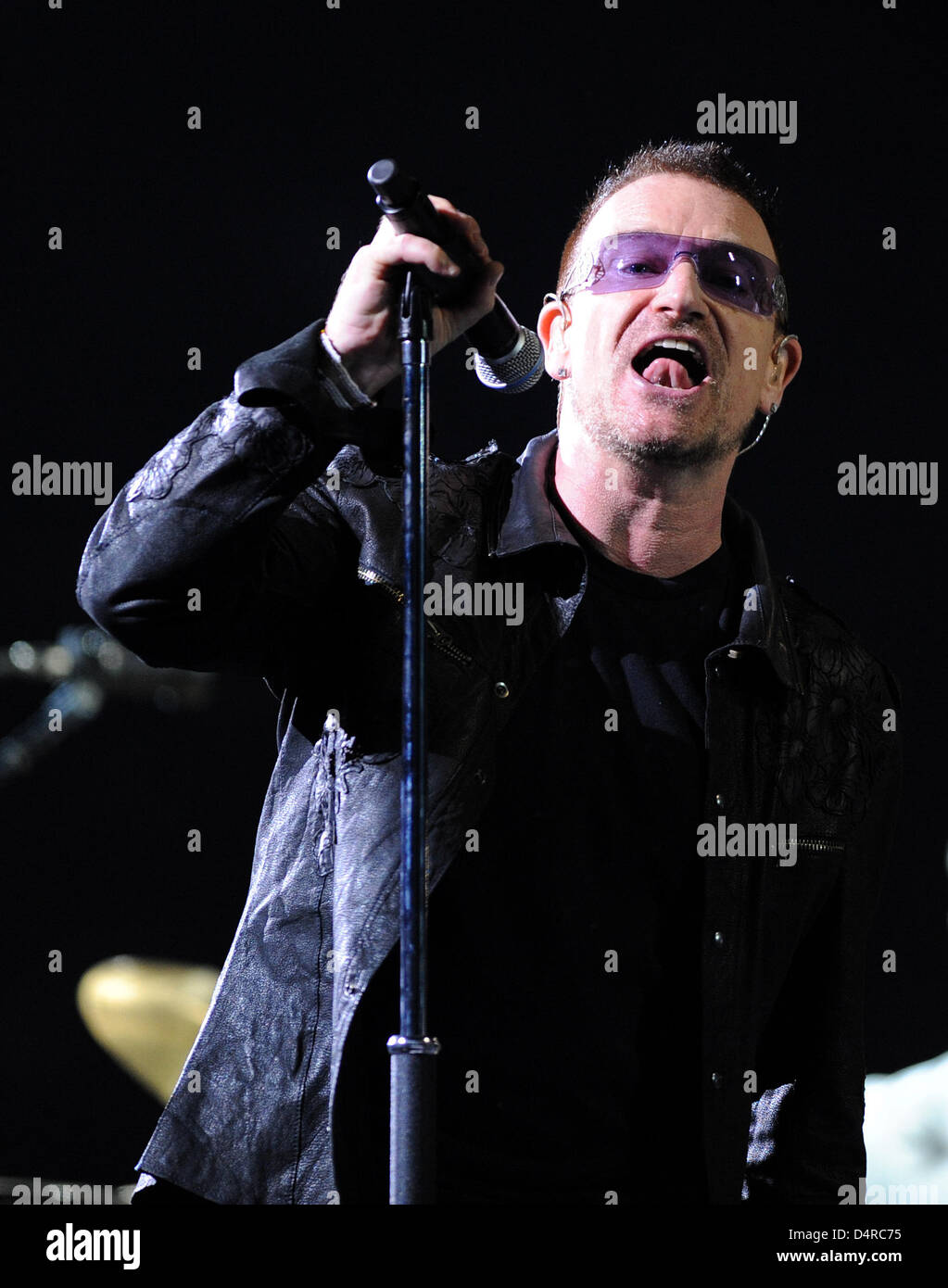 Irish pop band U2 with singer Bono perform in Gelsenkirchen, Germany ...