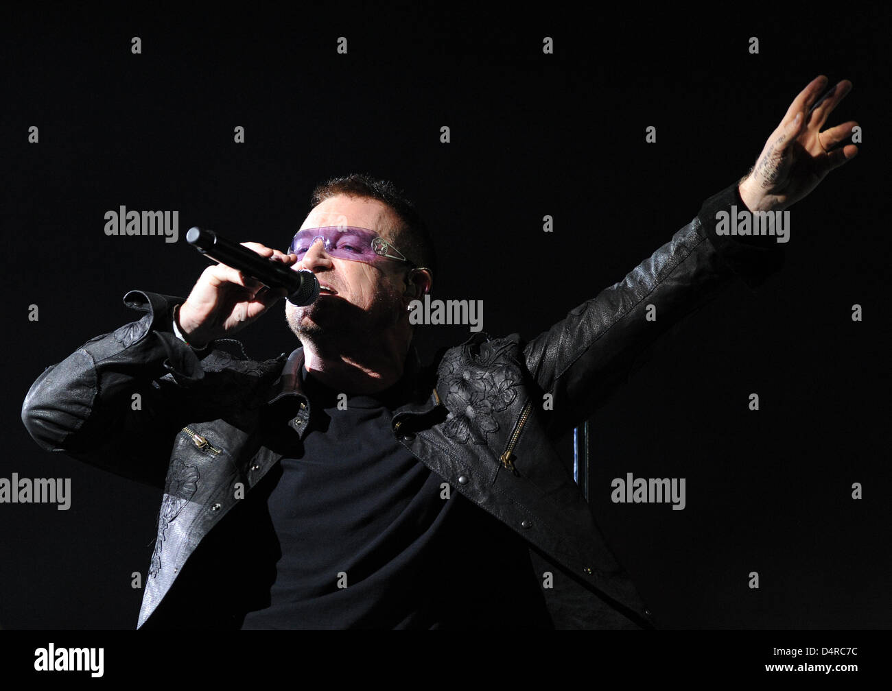 Irish pop band U2 with singer Bono perform in Gelsenkirchen, Germany ...