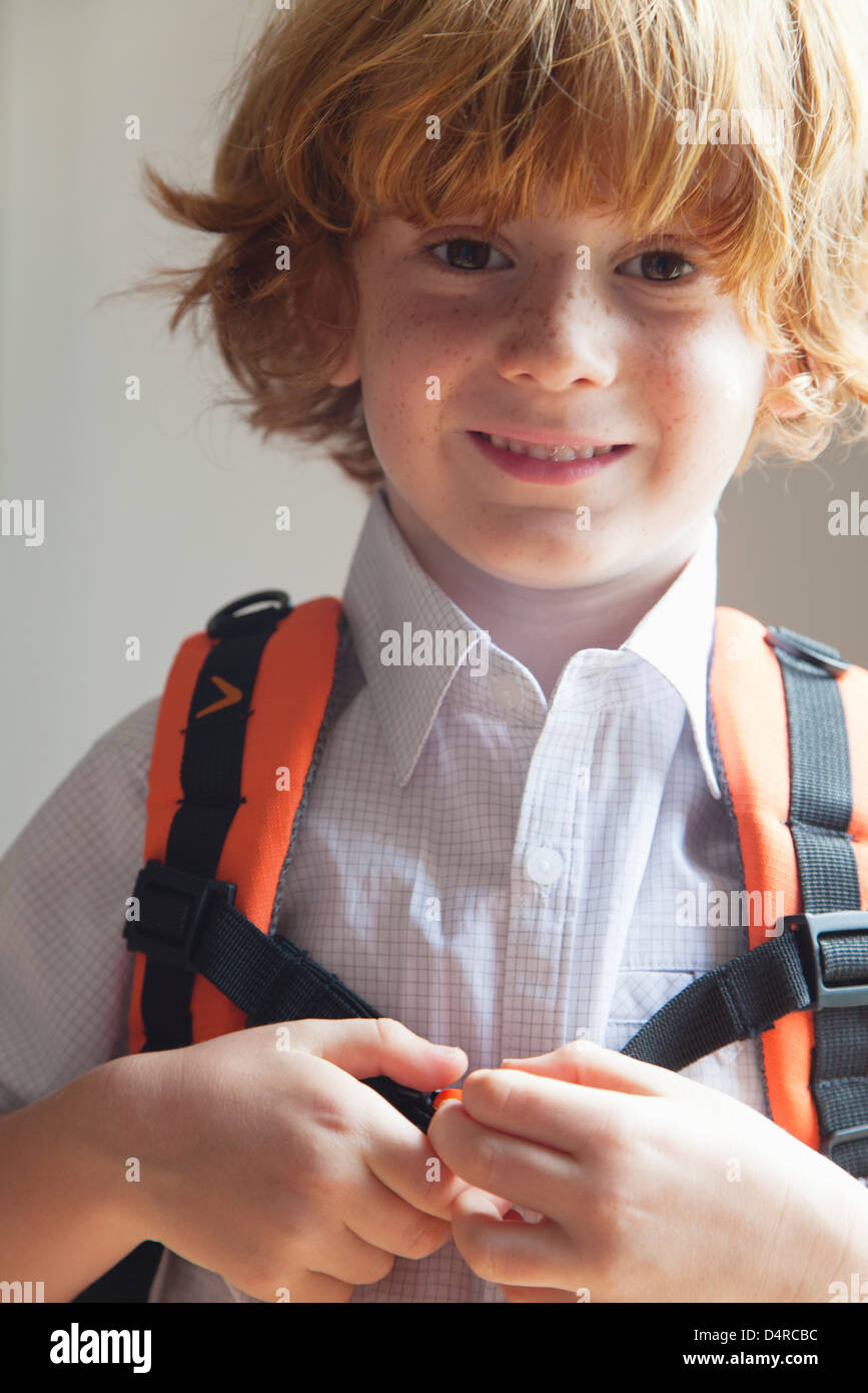 Boy wearing backpack, portrait Stock Photo - Alamy