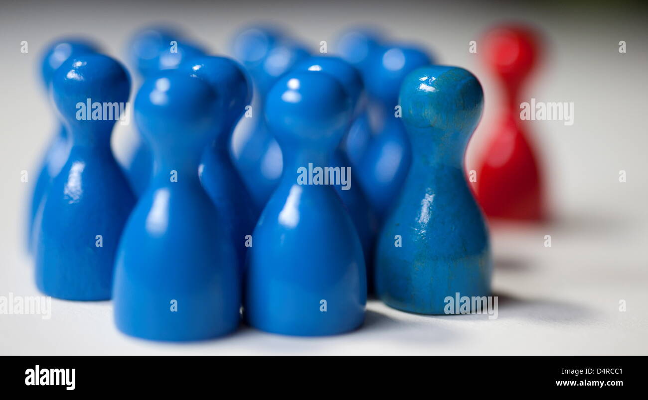 ILLUSTRATION - A red board game figure depicted in the background ...