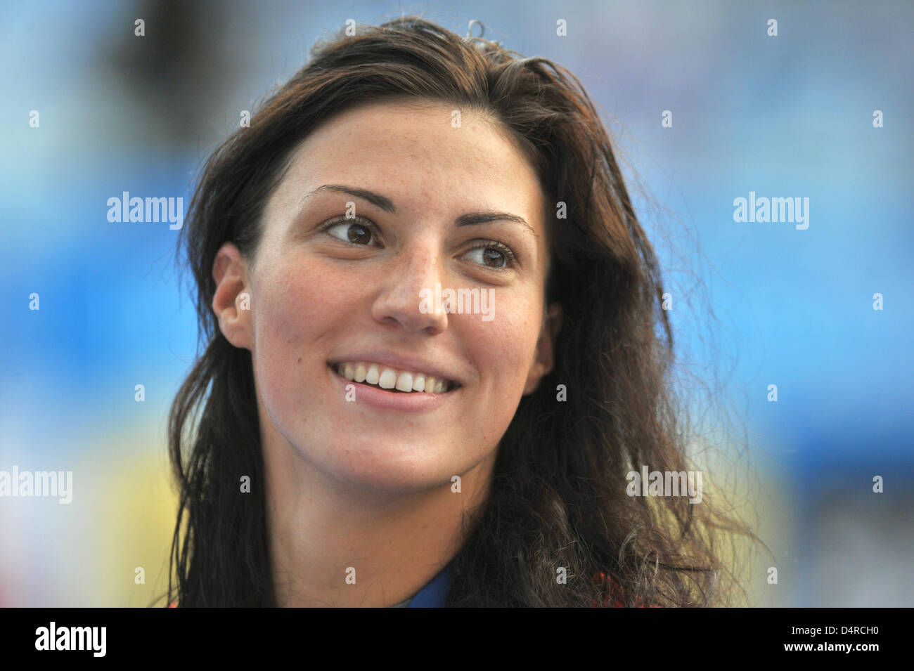 Austria?s Mirna Jukic smiles after finishing third in the 200m ...