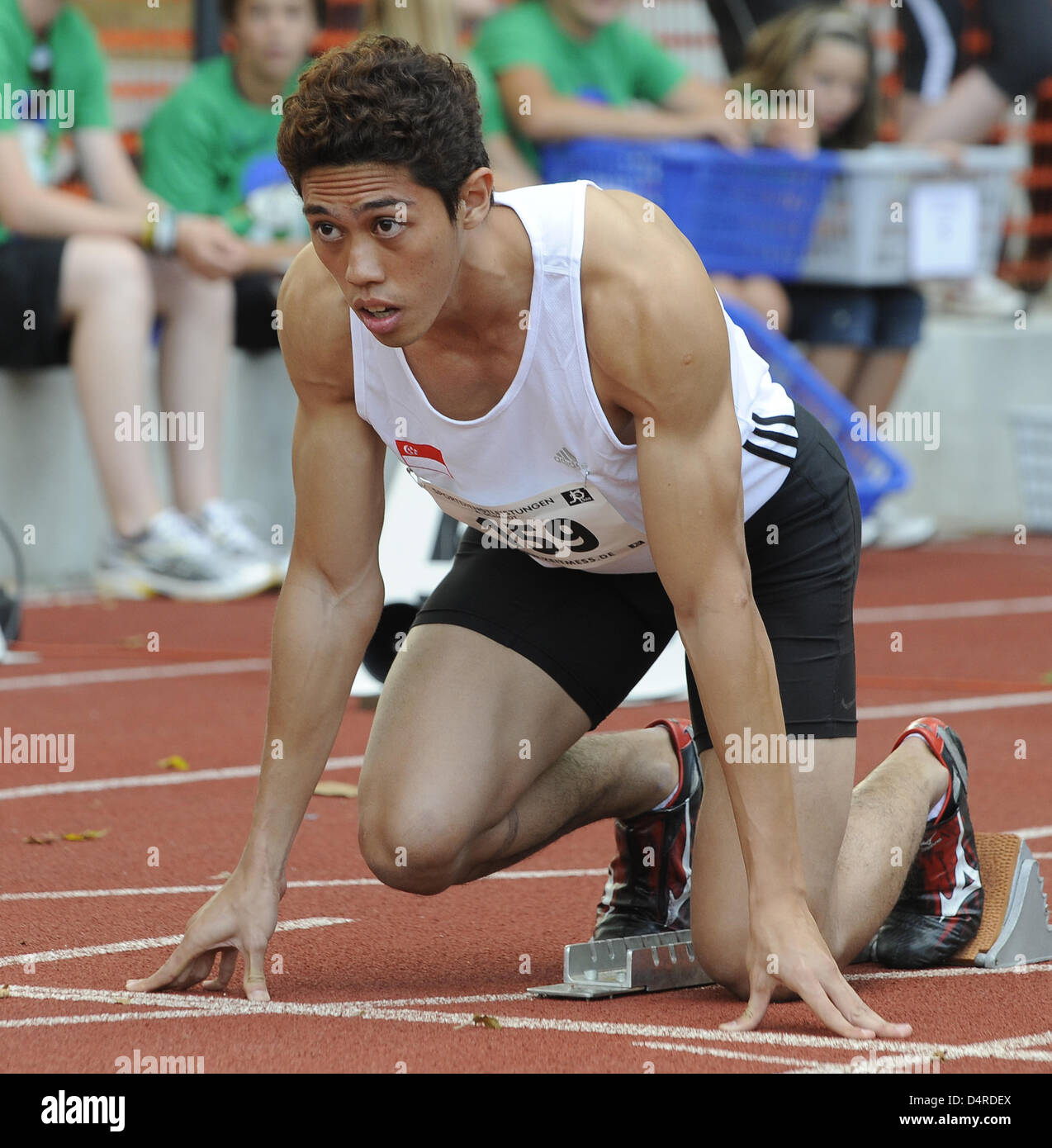 Singapore?s sprinter Abdulhalim bin Abdulhakim prepares for a start in ...