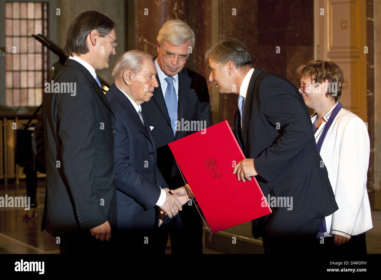 Berlin?s Lord Mayor Klaus Wowereit (2-R) awards Werner Otto (2-L ...