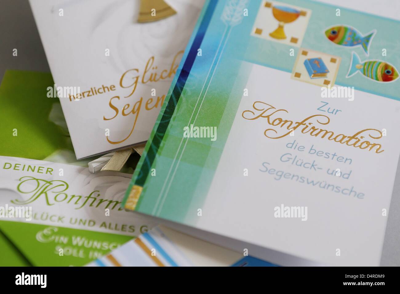 The illustration shows a set of confirmation cards on display on a ...