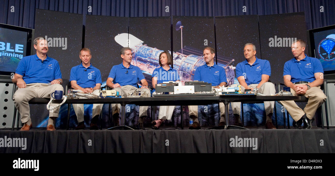The crew of STS-125, including astronauts like Andrew Feustel and John ...