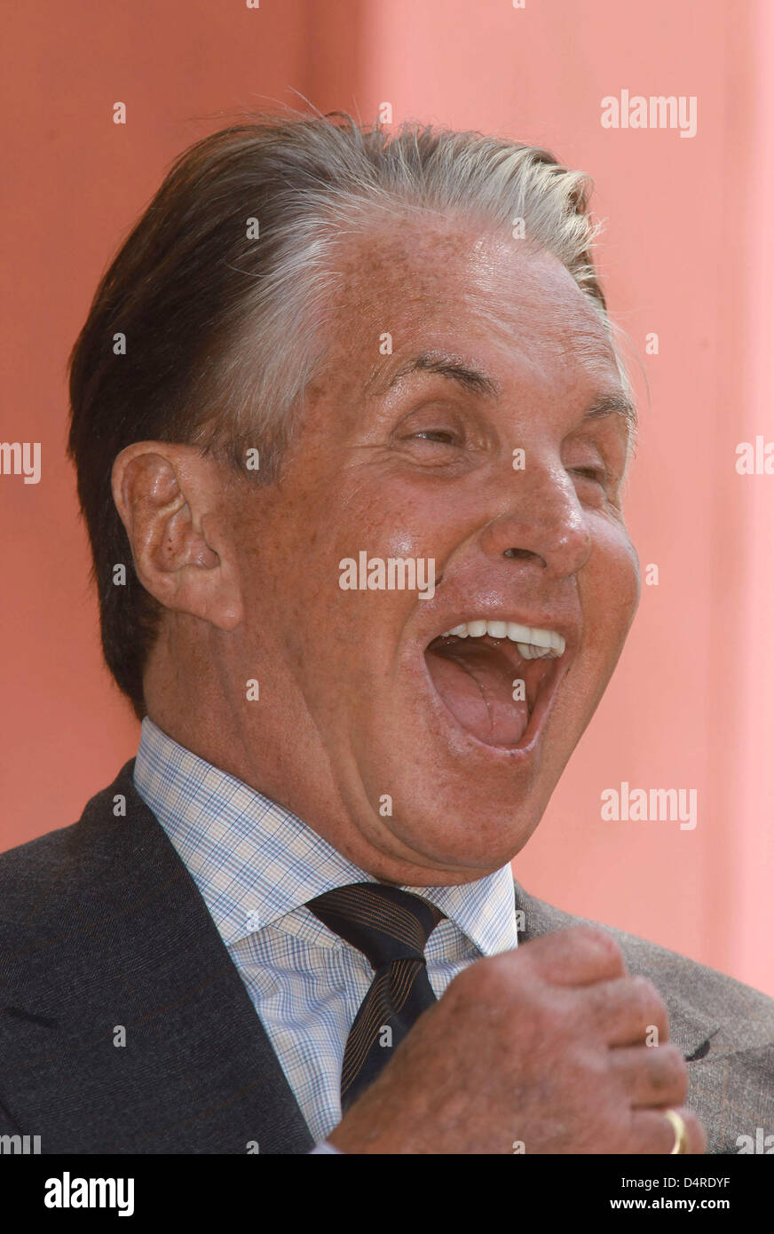 US actor George Hamilton poses during the ceremony for his new star on ...