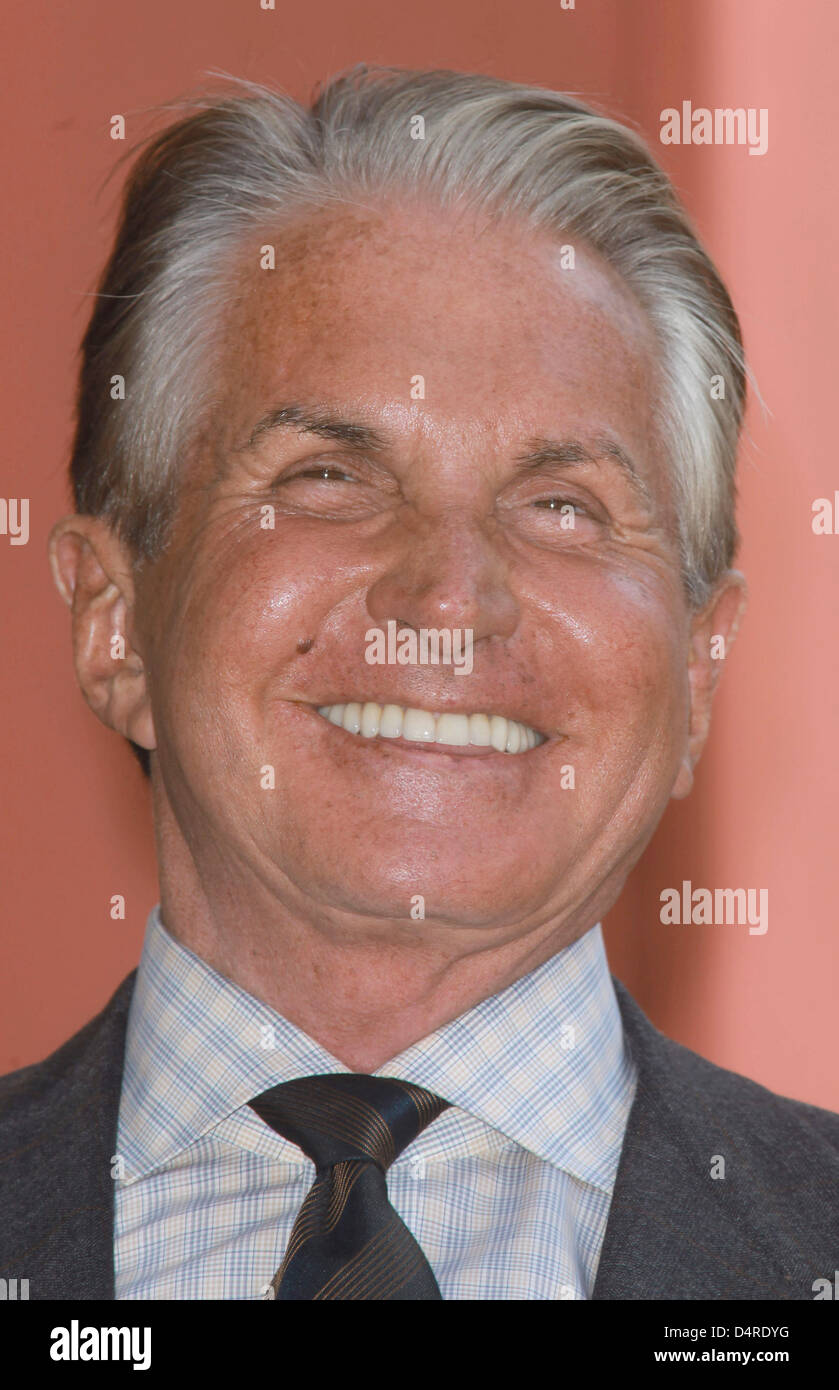 US actor George Hamilton poses during the ceremony for his new star on ...