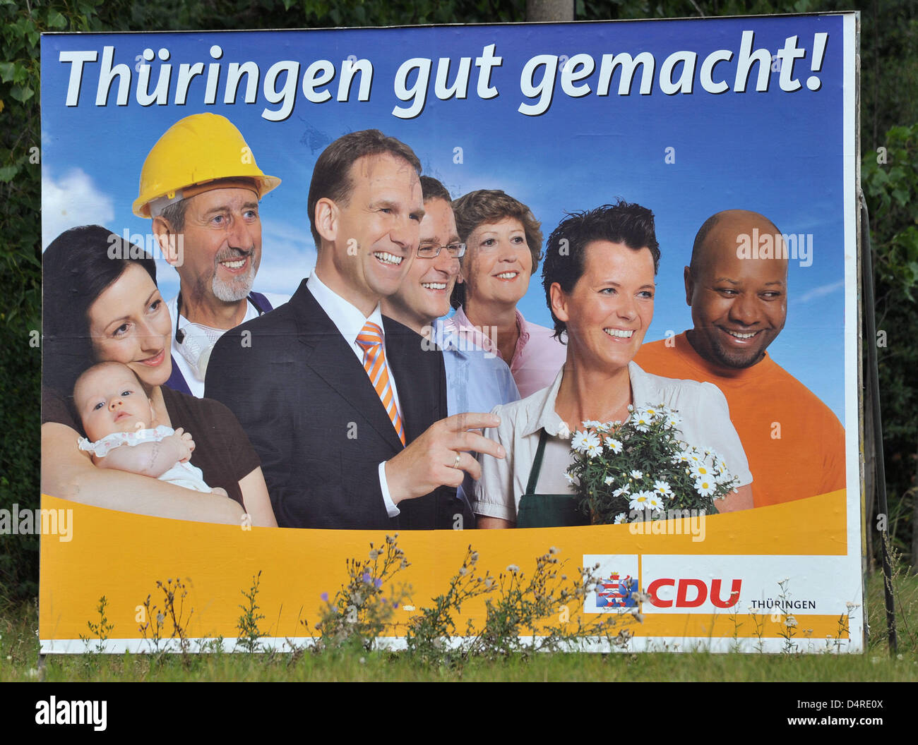 Angolan-born Zeca Schall (R) pictured on an election poster of the ...