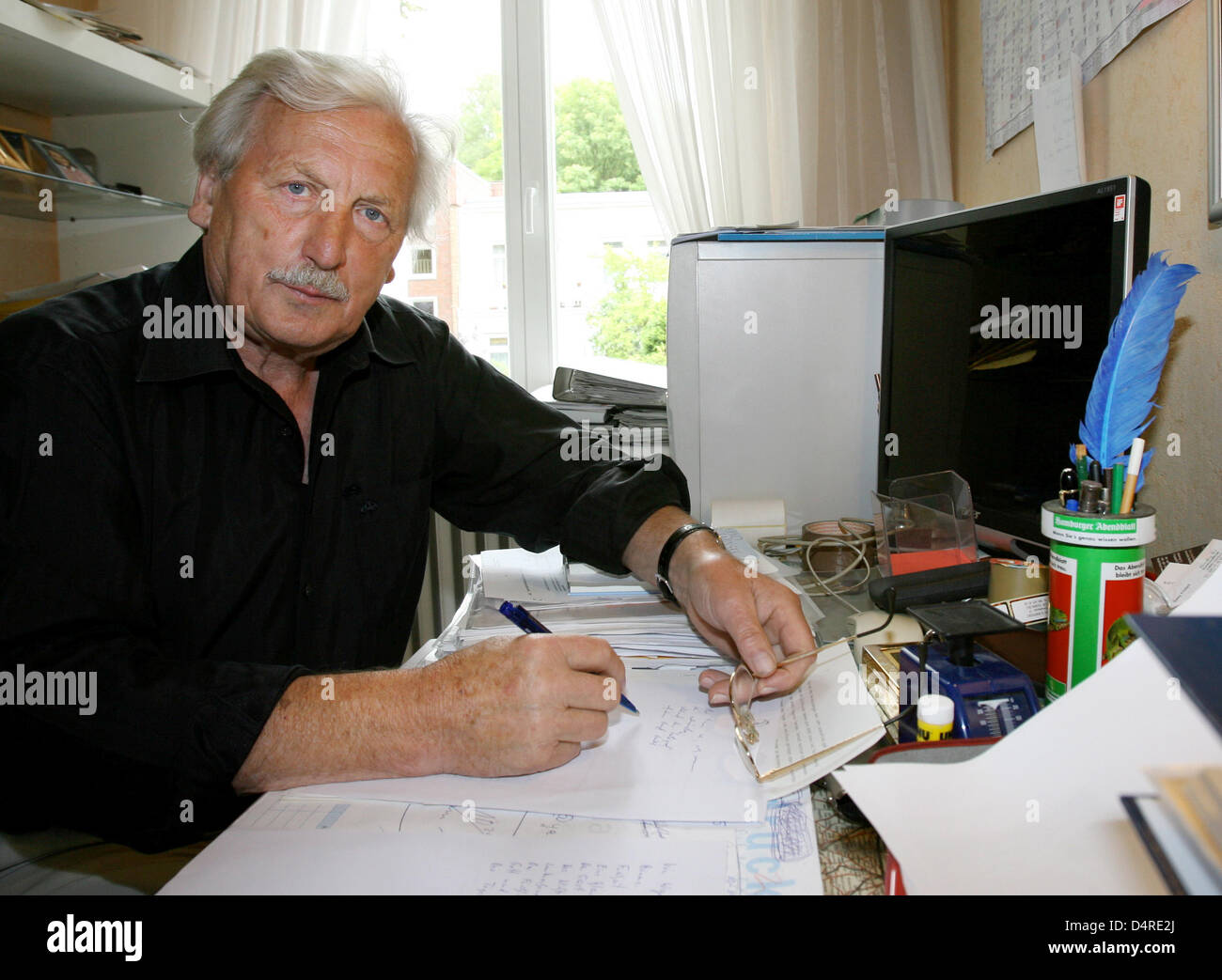German author Arno Surminski poses in his office room in Hamburg ...
