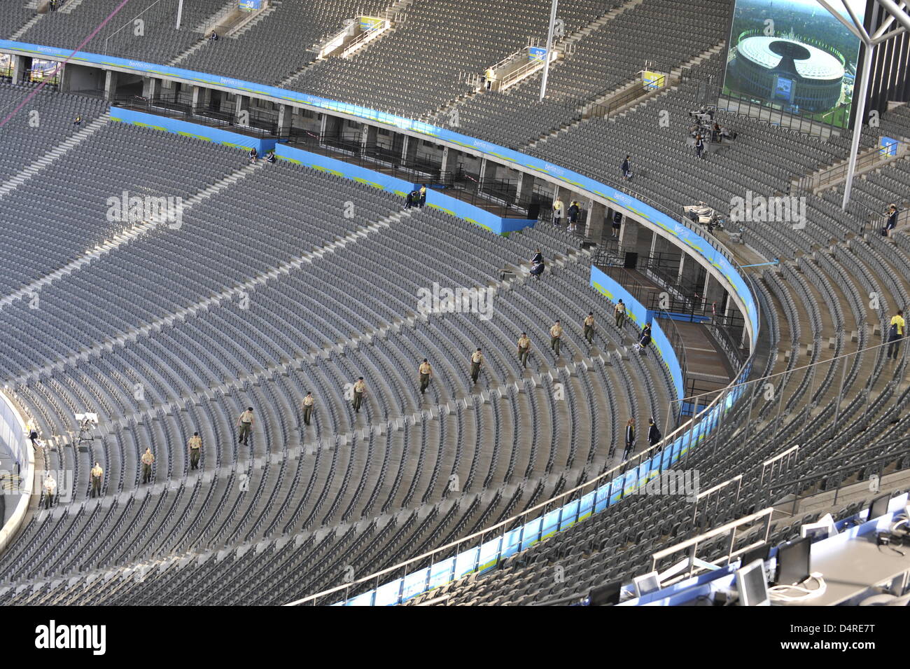 Police officers check the stands in the Olympic stadium prior to start ...