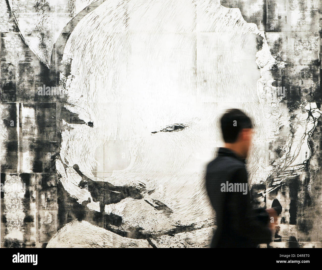 A man walks by the artwork ?DU Child? by Japanese artist Keisuke ...