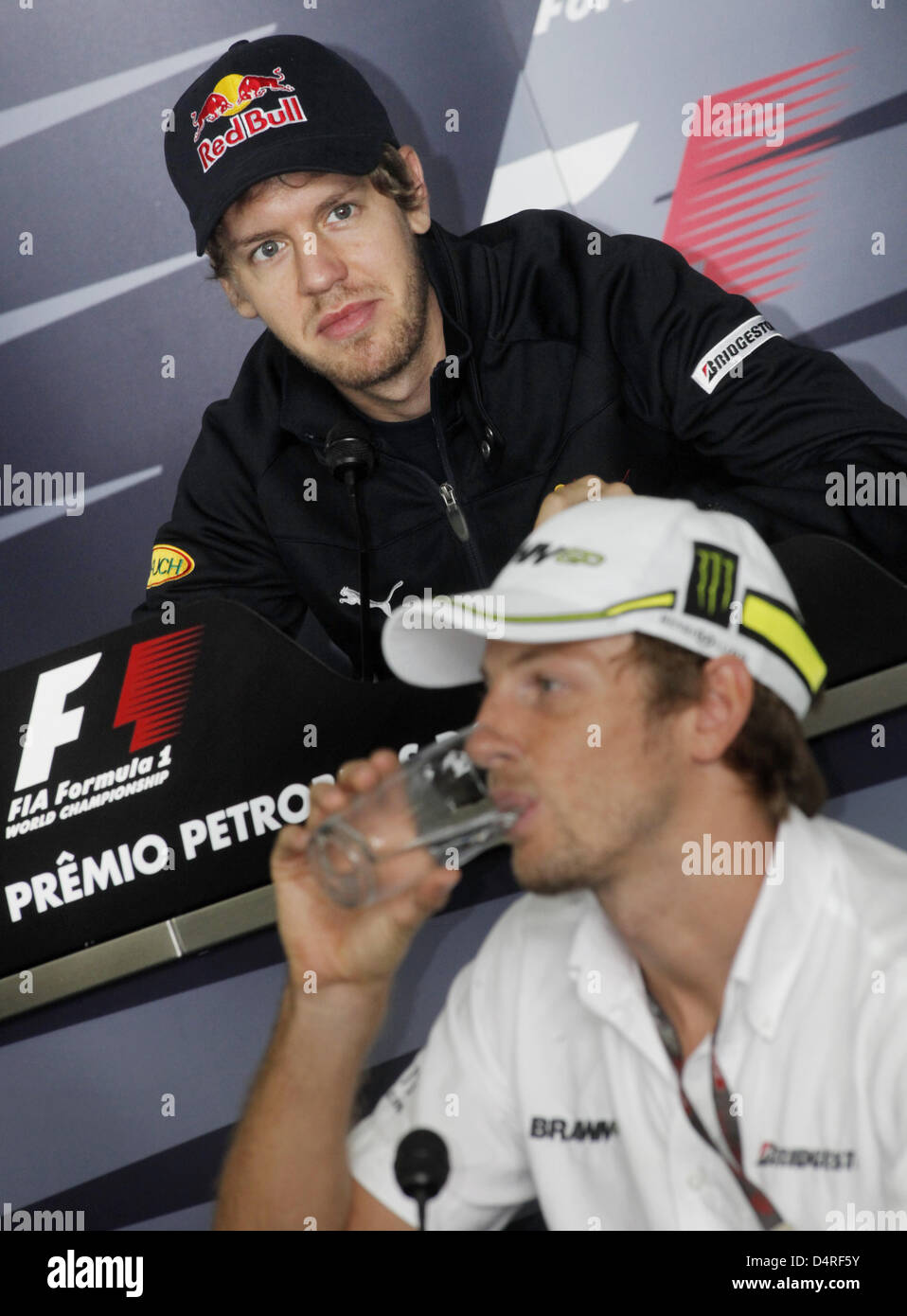 (L-R) German Formula One driver Sebastian Vettel of Red Bull Racing and ...