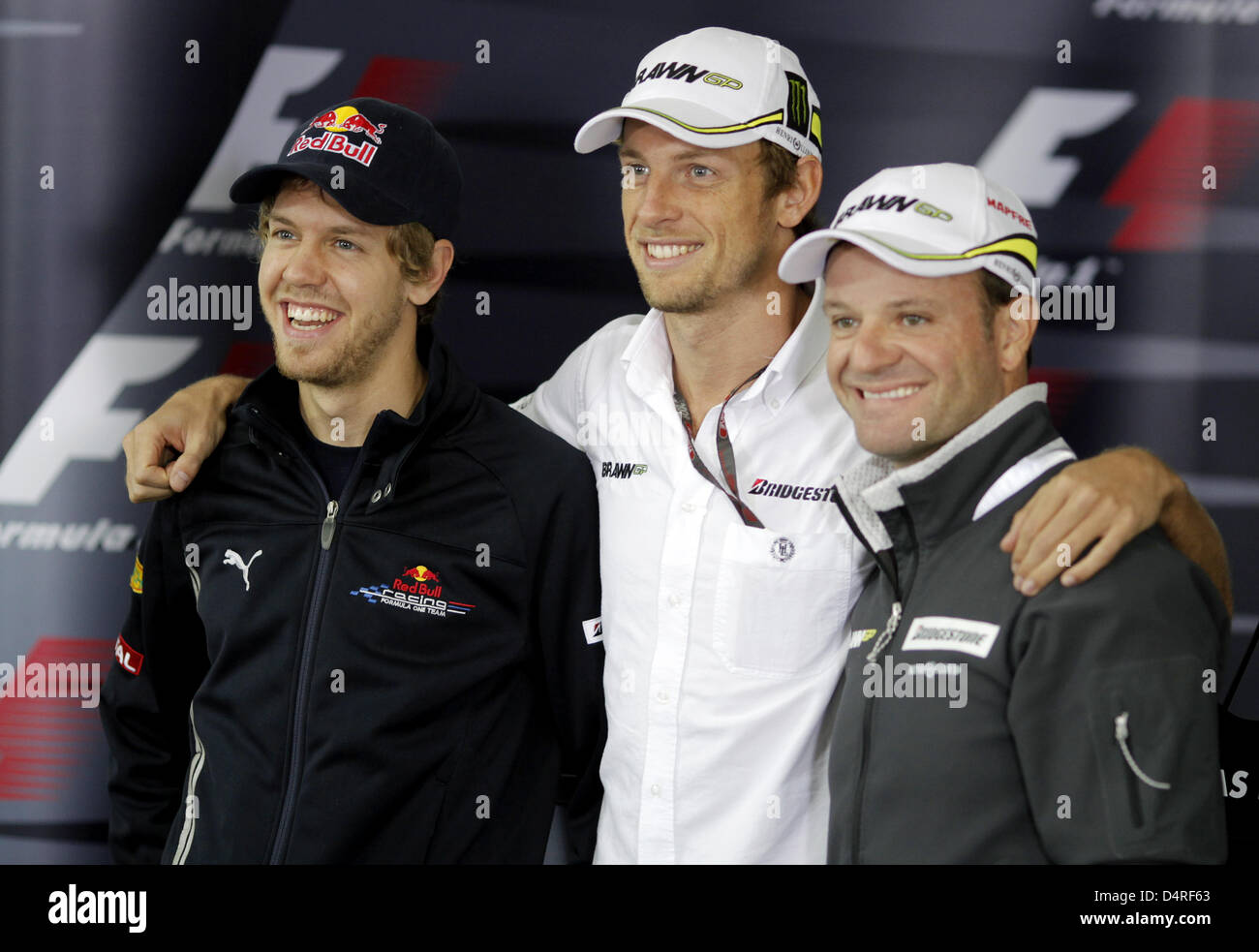 (L-R) German Formula One driver Sebastian Vettel of Red Bull Racing ...
