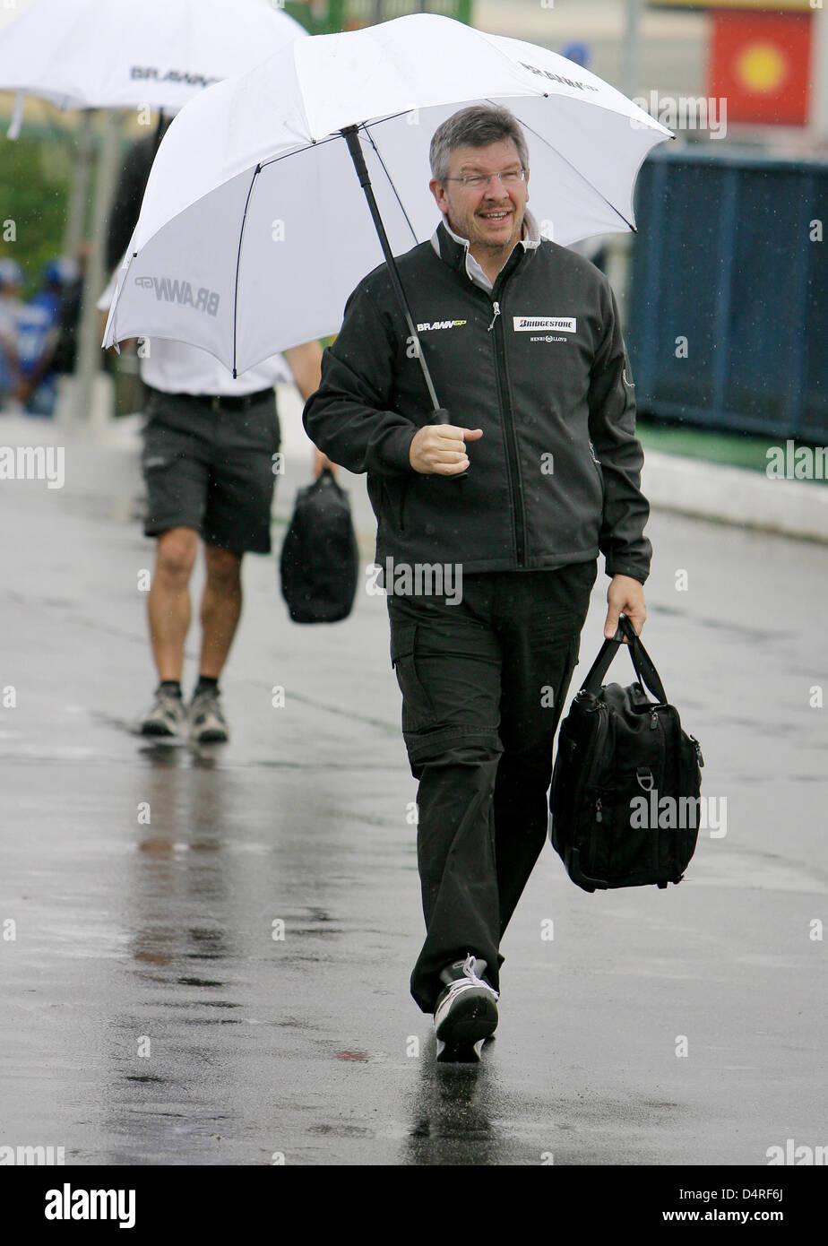 British Ross Brawn, team principal of Brawn GP, walks through the ...