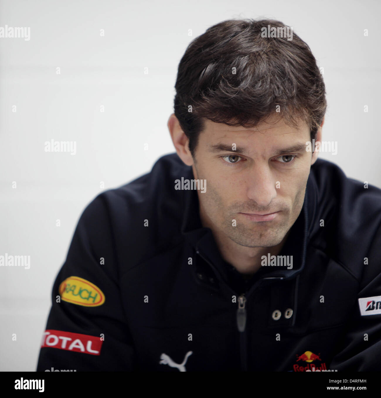 Australian Formula One driver Mark Webber of Red Bull Racing sits in ...