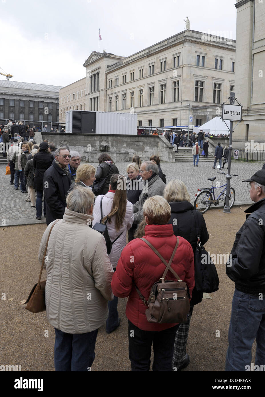 Visitors to the reopened New Museum queue in Berlin, Germany, 17 ...
