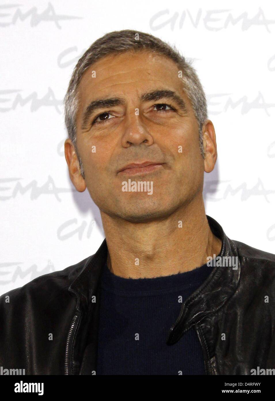 US actor George Clooney poses at a photo call for the film ?Up In The ...