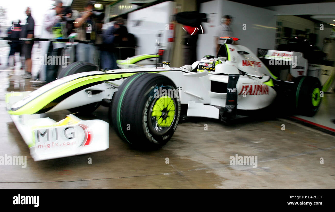 British Formula One driver Jenson Button of Brawn GP exits the pits ...