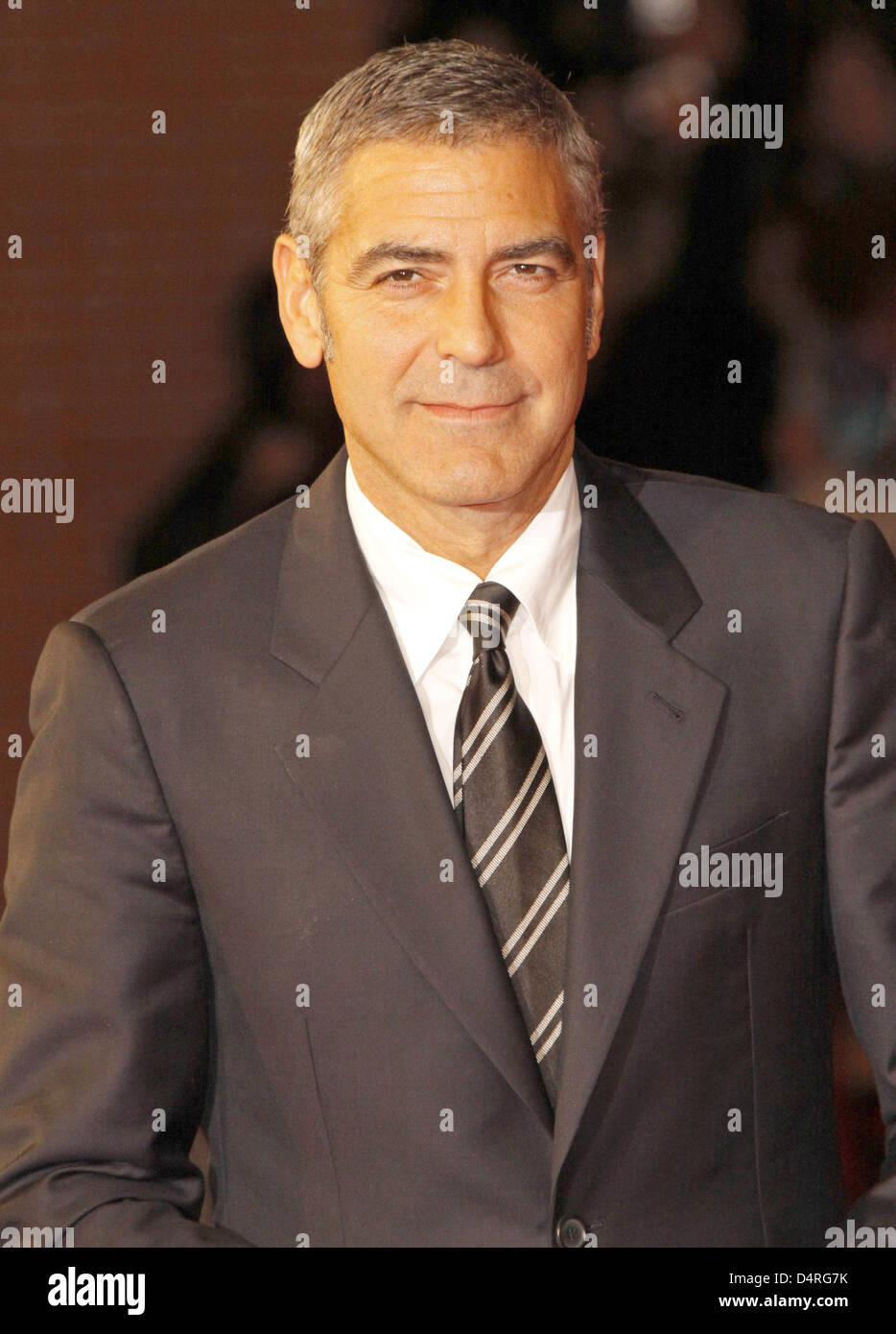 US actor George Clooney arrives for the premiere of the film ?Up In The ...