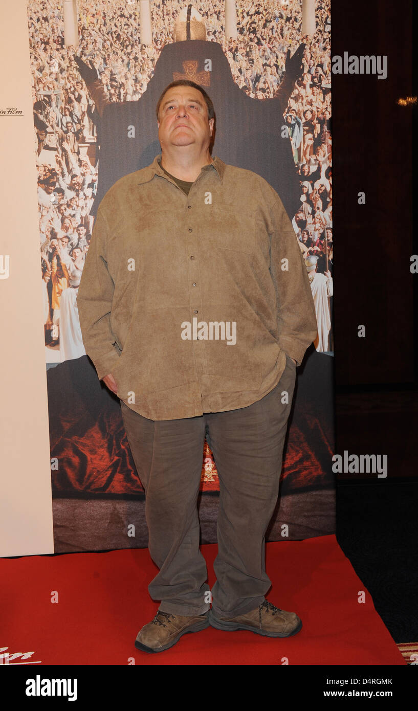 US actor John Goodman stands in front of a film poster during a photo ...