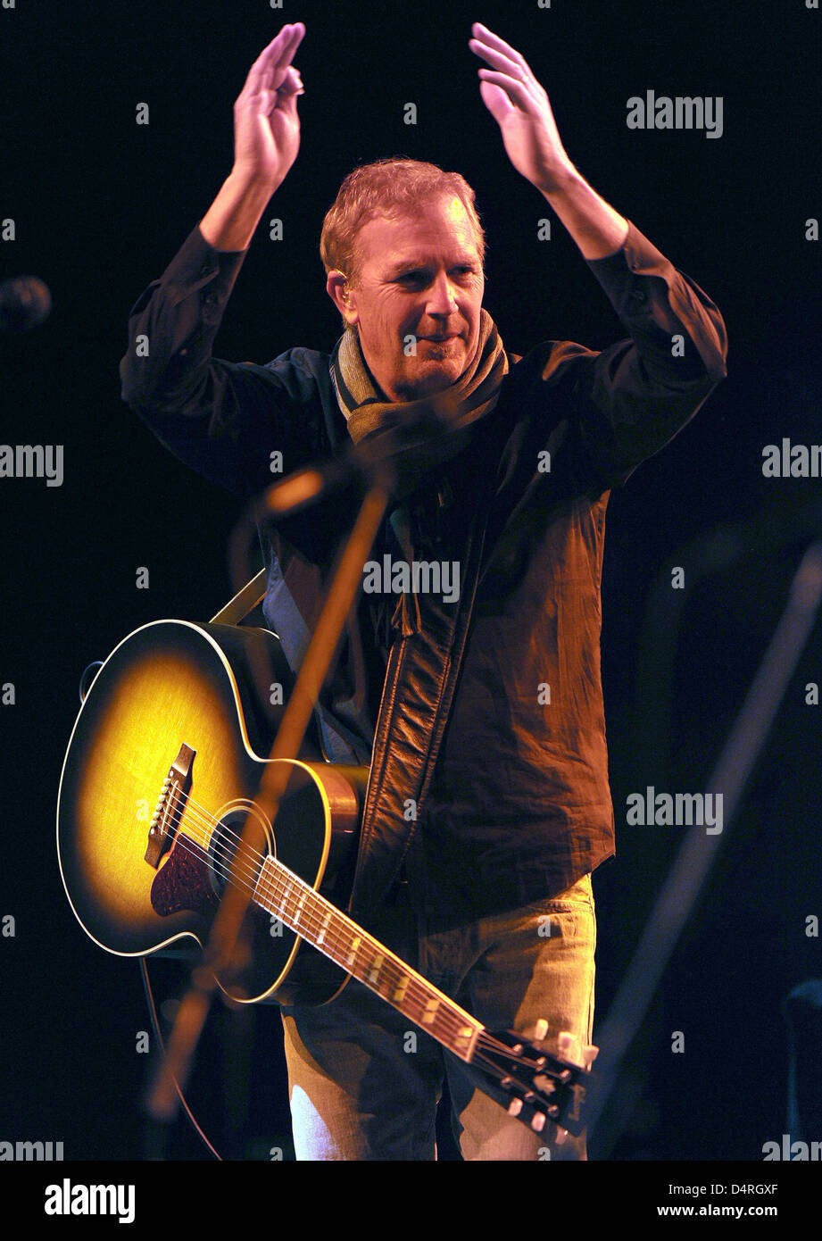 US actor and musician Kevin Costner performs during a concert with his ...