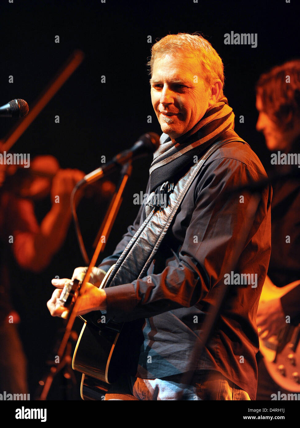 US actor and musician Kevin Costner performs during a concert with his ...