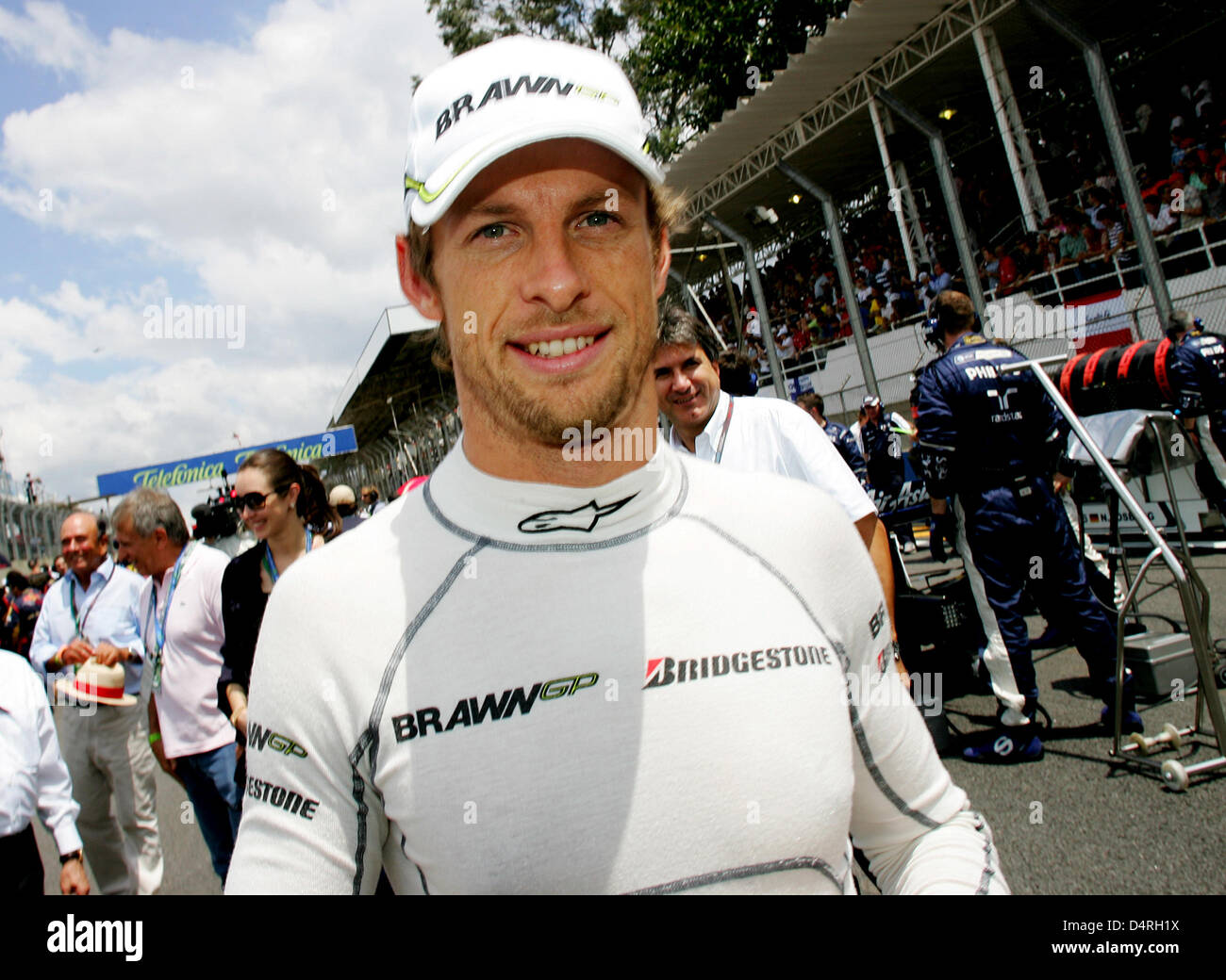 British Formula One driver Jenson Button of Brawn GP smiles in the grid ...