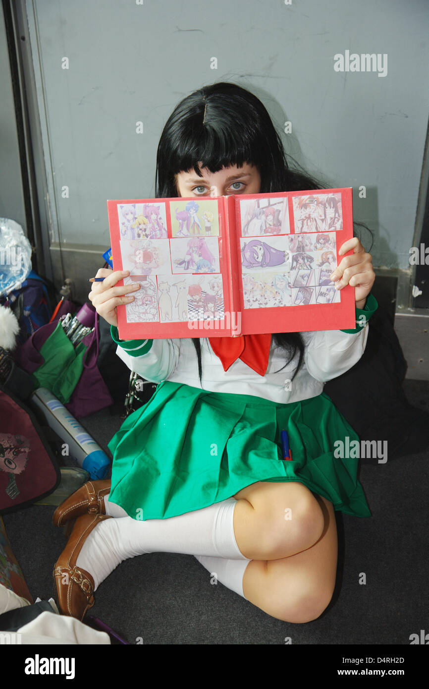 A cosplayer poses at the Book Fair in Frankfurt Main, Germany, 17 ...