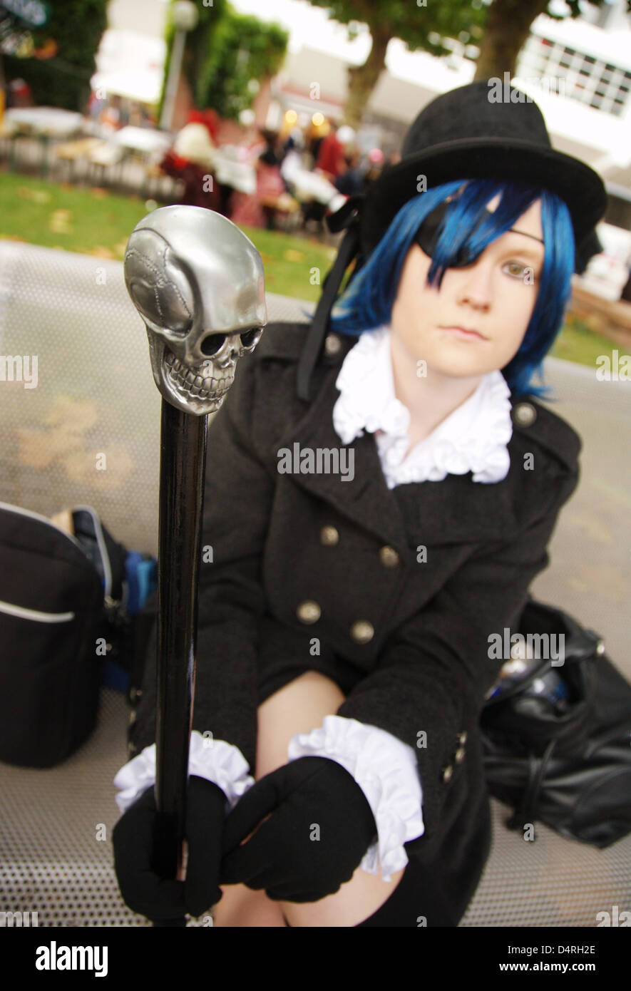 A cosplayer poses at the Book Fair in Frankfurt Main, Germany, 17 ...