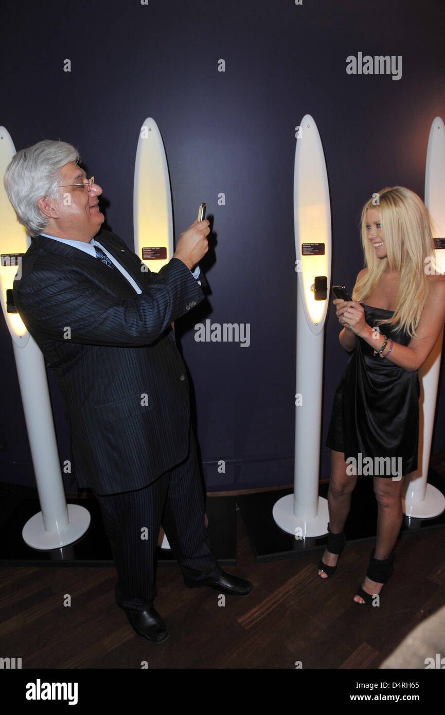 Mike Lazaridis, BlackBerry inventor, and actress Tara Reid attend the ...