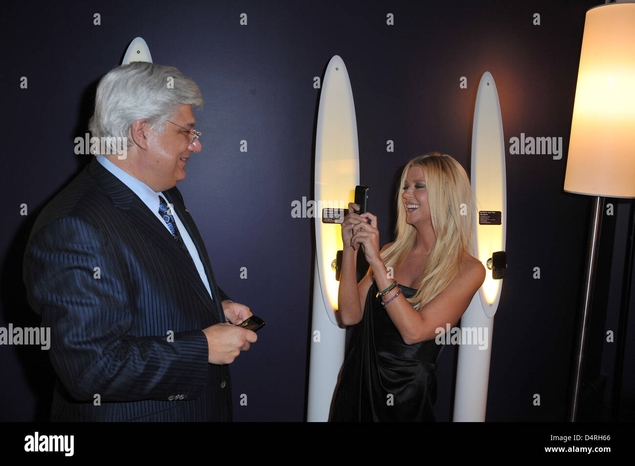 Mike Lazaridis, BlackBerry inventor, and actress Tara Reid attend the ...