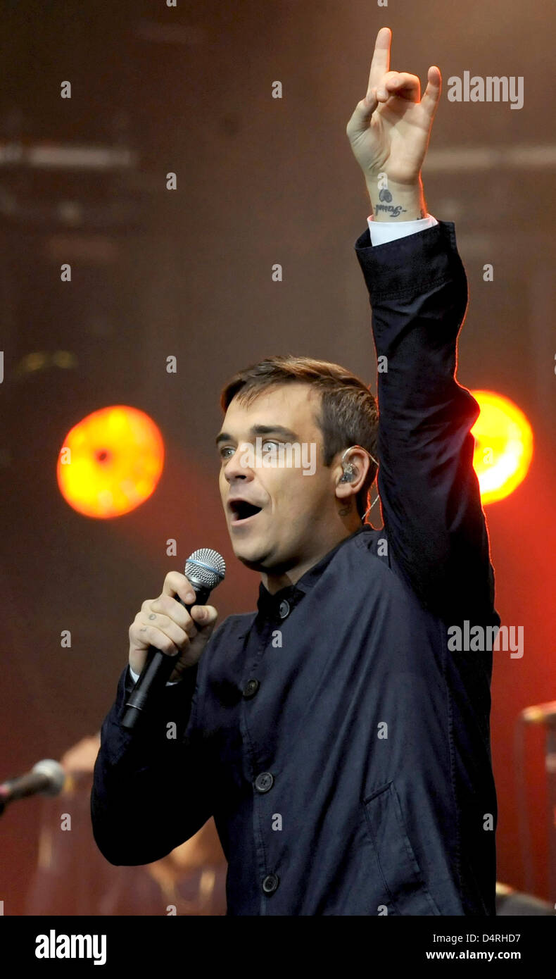 British singer Robbie Williams performs outside Max Schmeling hall in ...