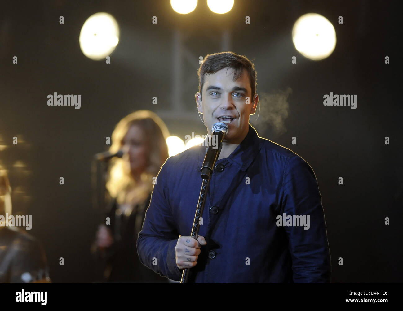 British singer Robbie Williams performs outside Max Schmeling hall in ...