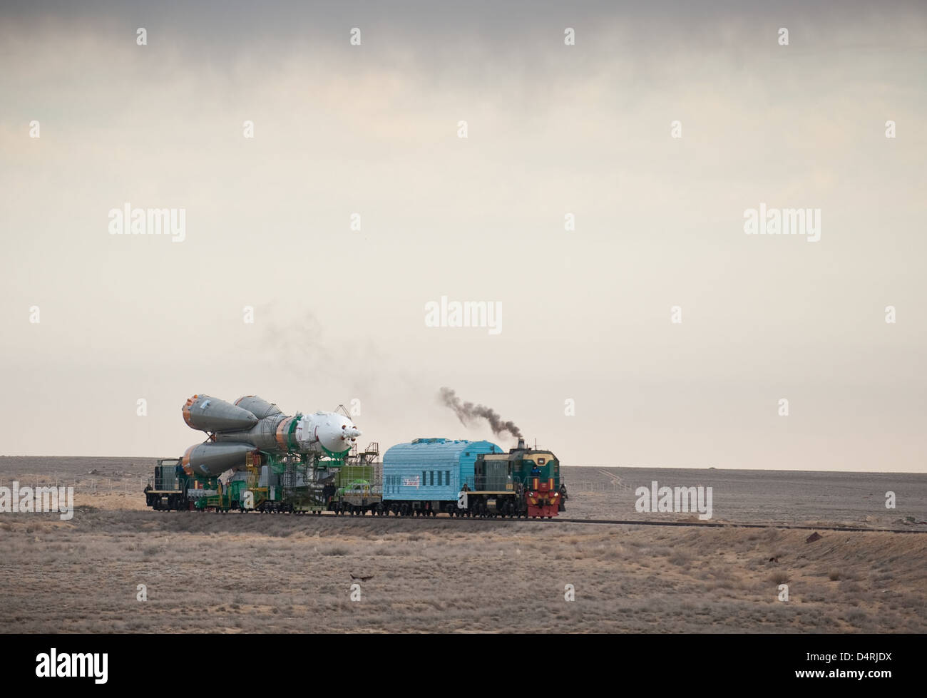 The Soyuz TMA-18 spacecraft is rolled out at Baikonur Cosmodrome in ...