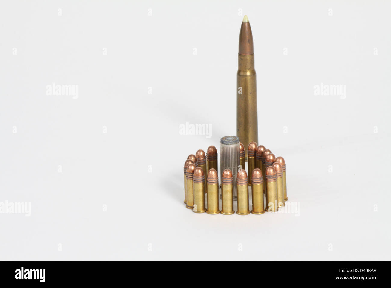 Different caliber ammunition against a light colored background Stock ...