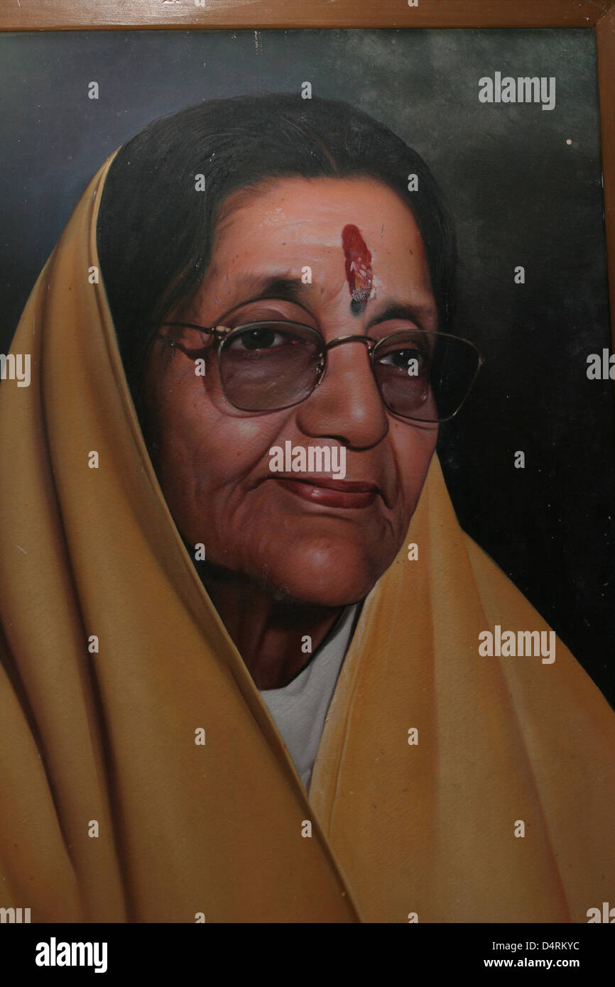 A painting of Sri Anandamayi in the main prayer hall of the Sri Sri ...