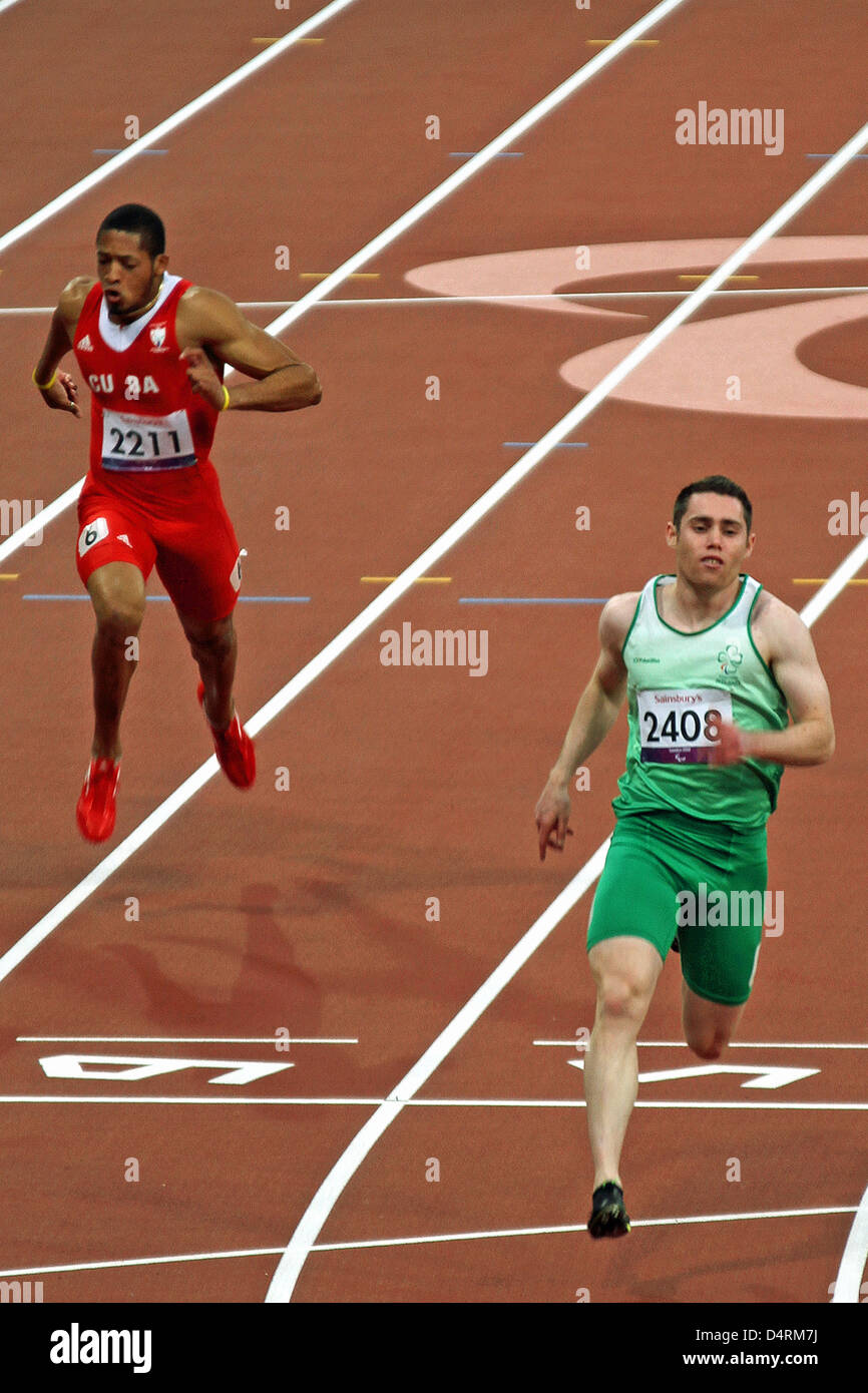 Jason Smyth of Ireland celebrates gold in the mens 100m - T13 in the ...