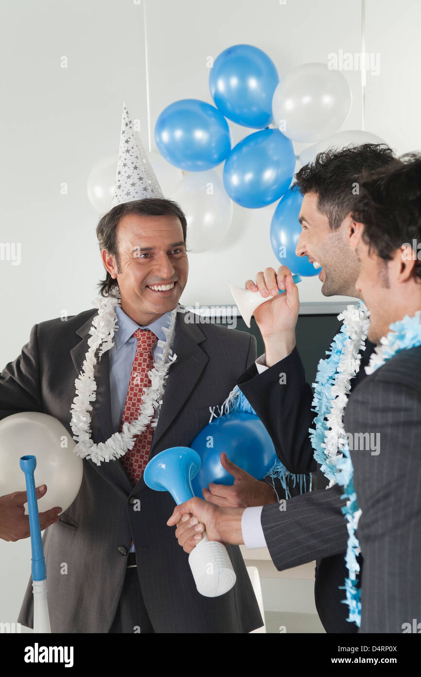 Businessmen in office party Stock Photo - Alamy