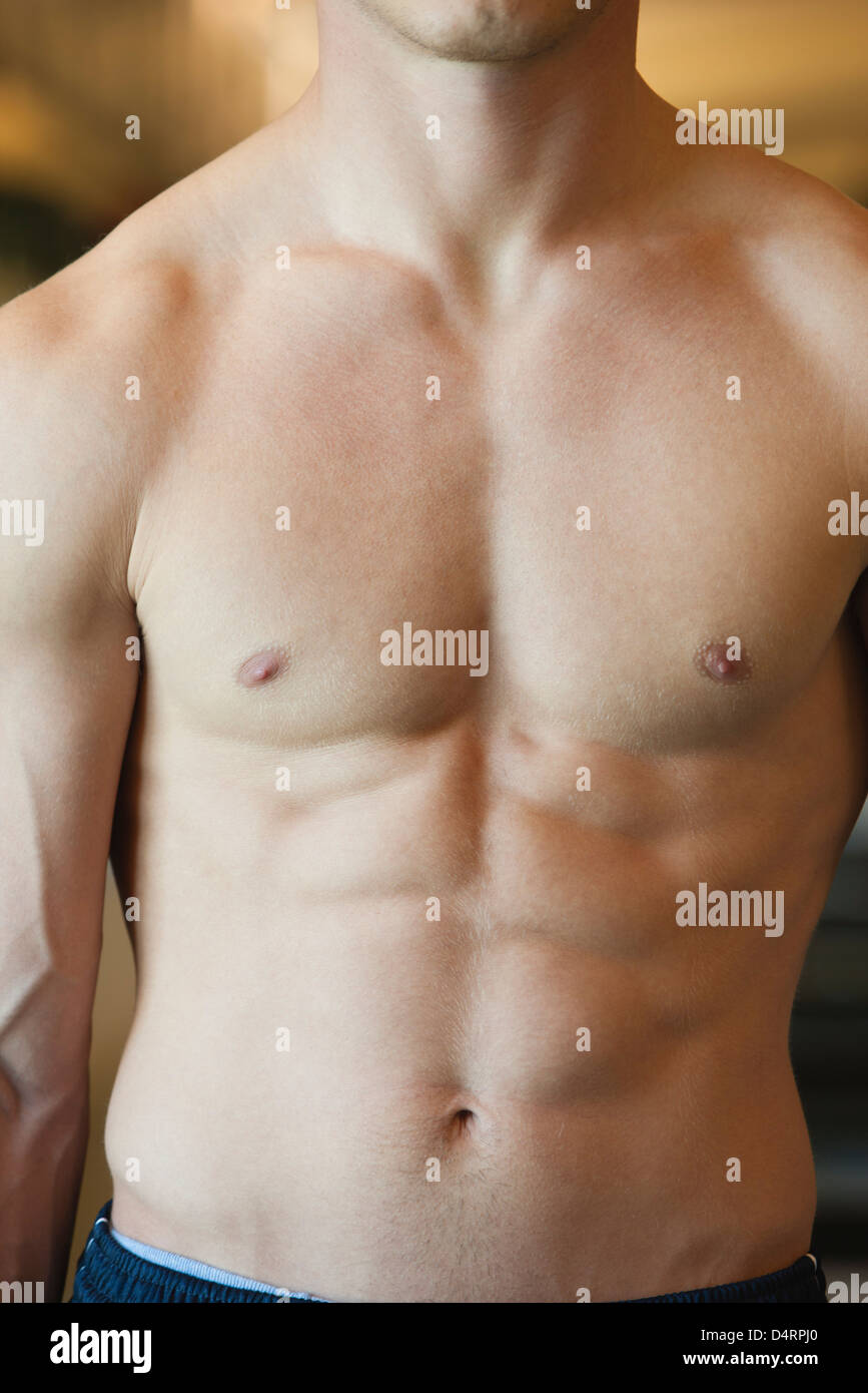 Barechested man, mid section Stock Photo - Alamy