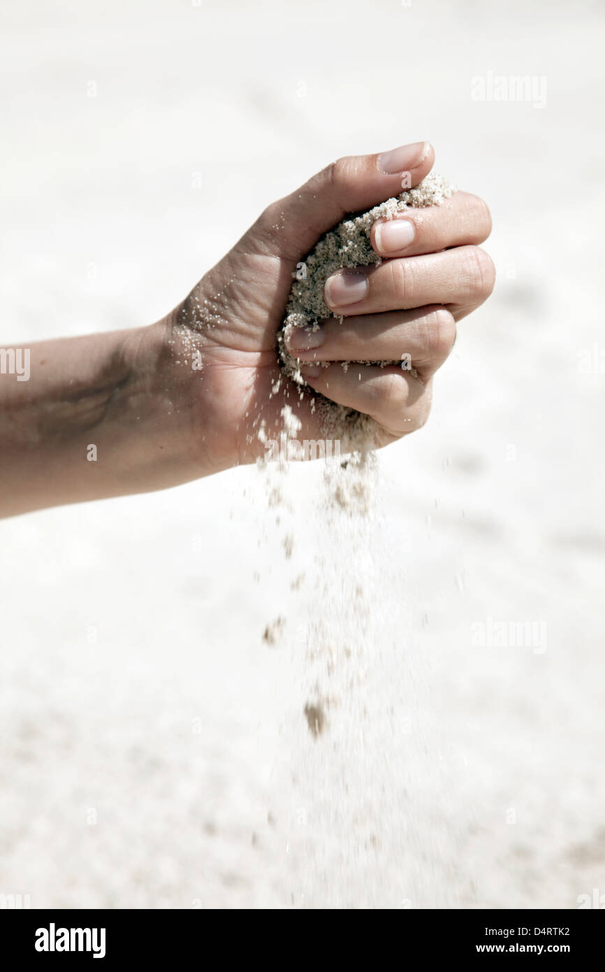 Hands With Sands of Time Stock Photo - Alamy
