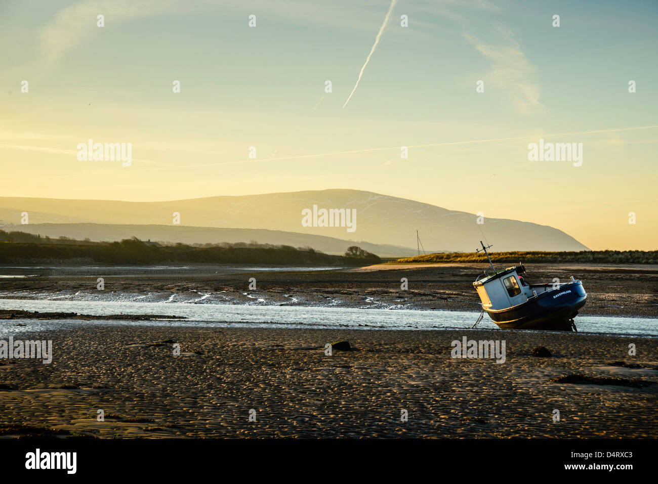 Boat by the estuary of the river Esk at Ravenglass in the Lake District ...
